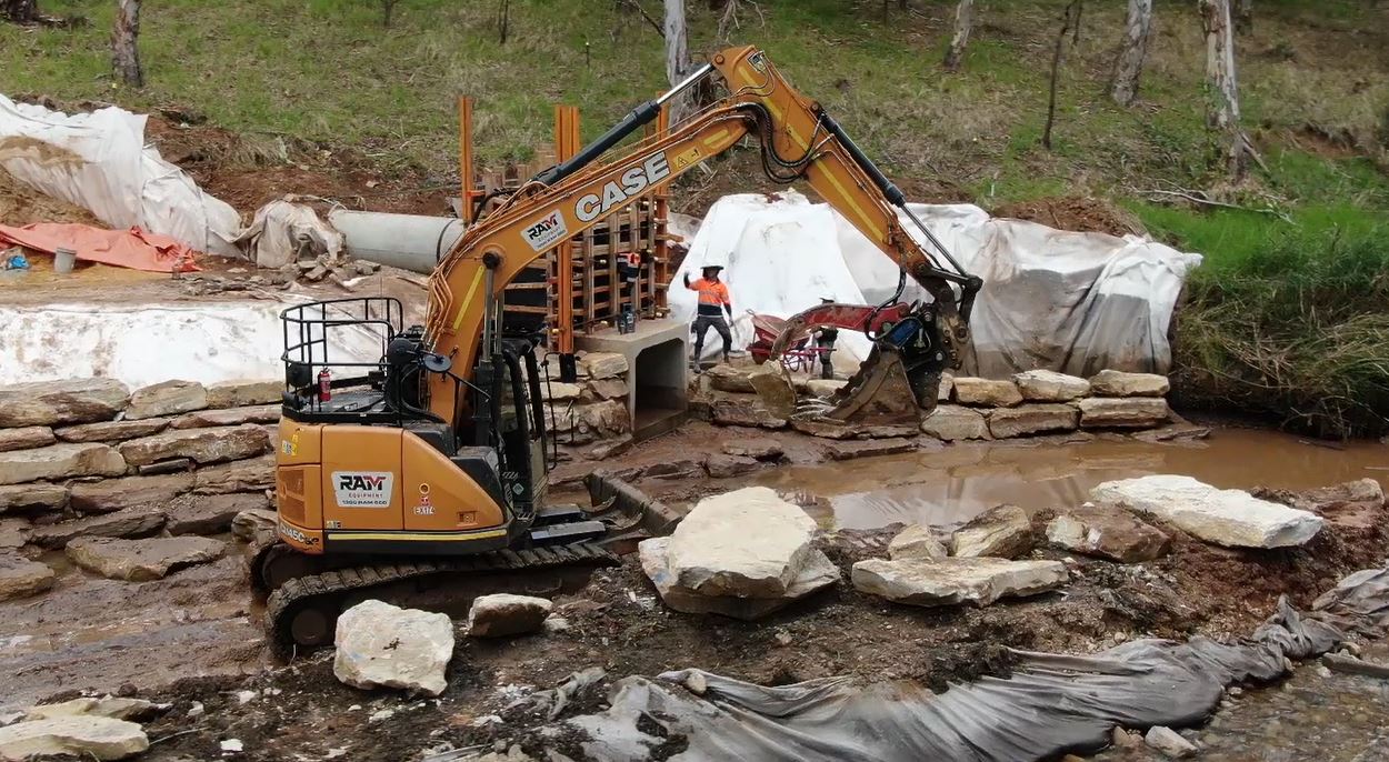 Urbans constructs erosion protection rock wall - Urbans